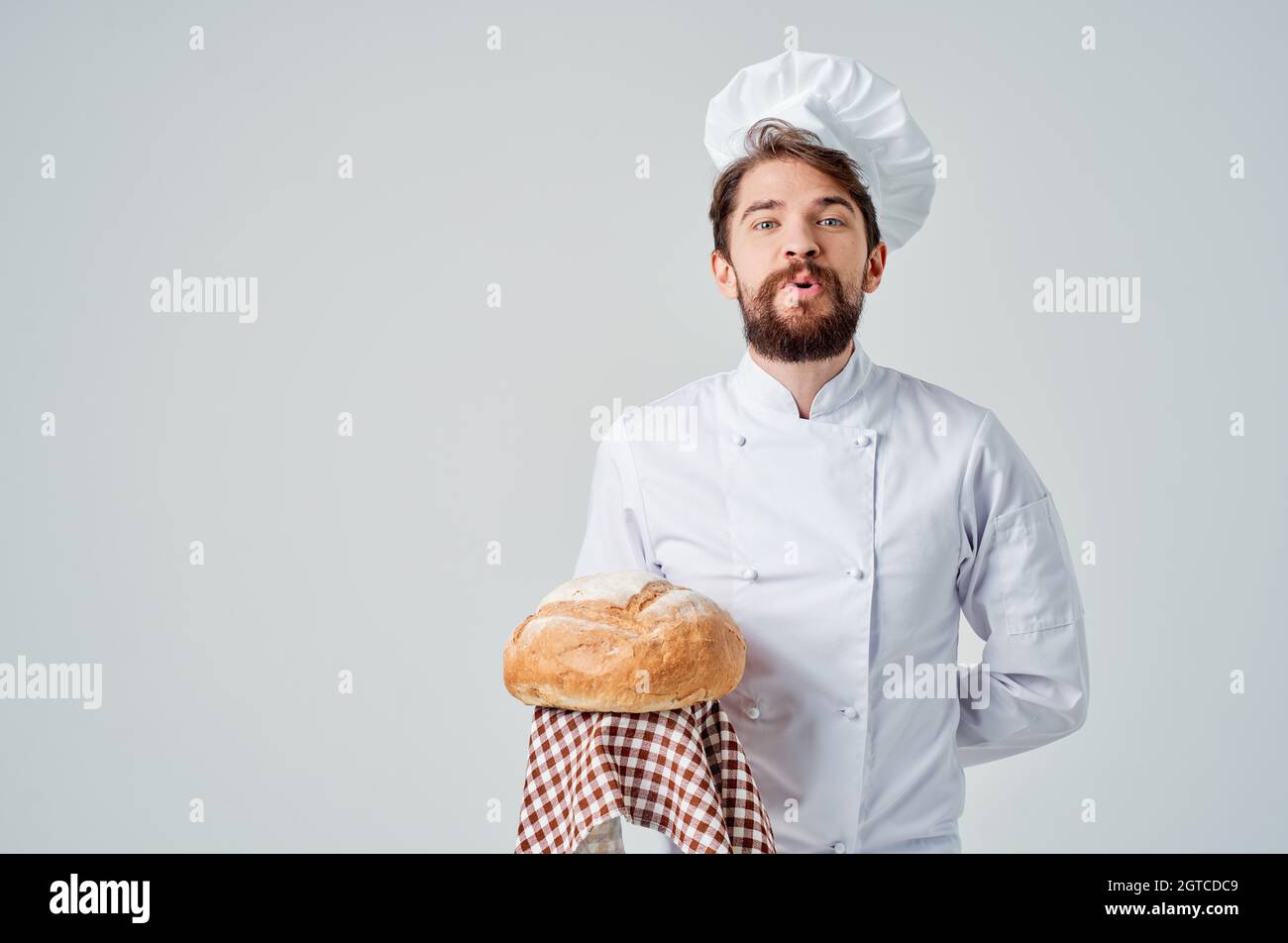 Baker Cooking bakery light background Stock Photo - Alamy