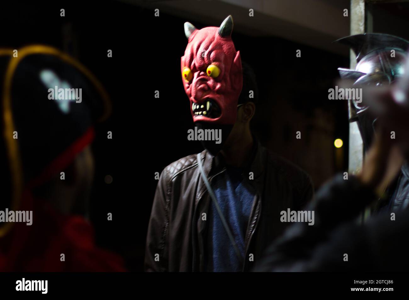 Man wearing demon mask hi-res stock photography and images - Alamy