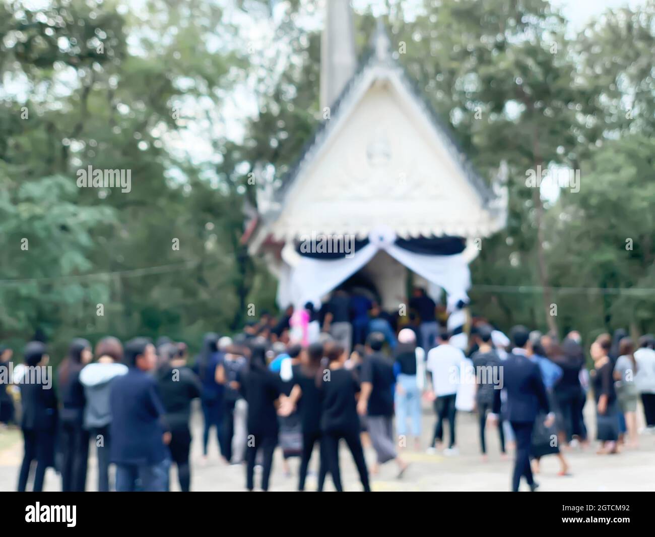 The image is blurred. The funeral of Buddhism in the process of ...