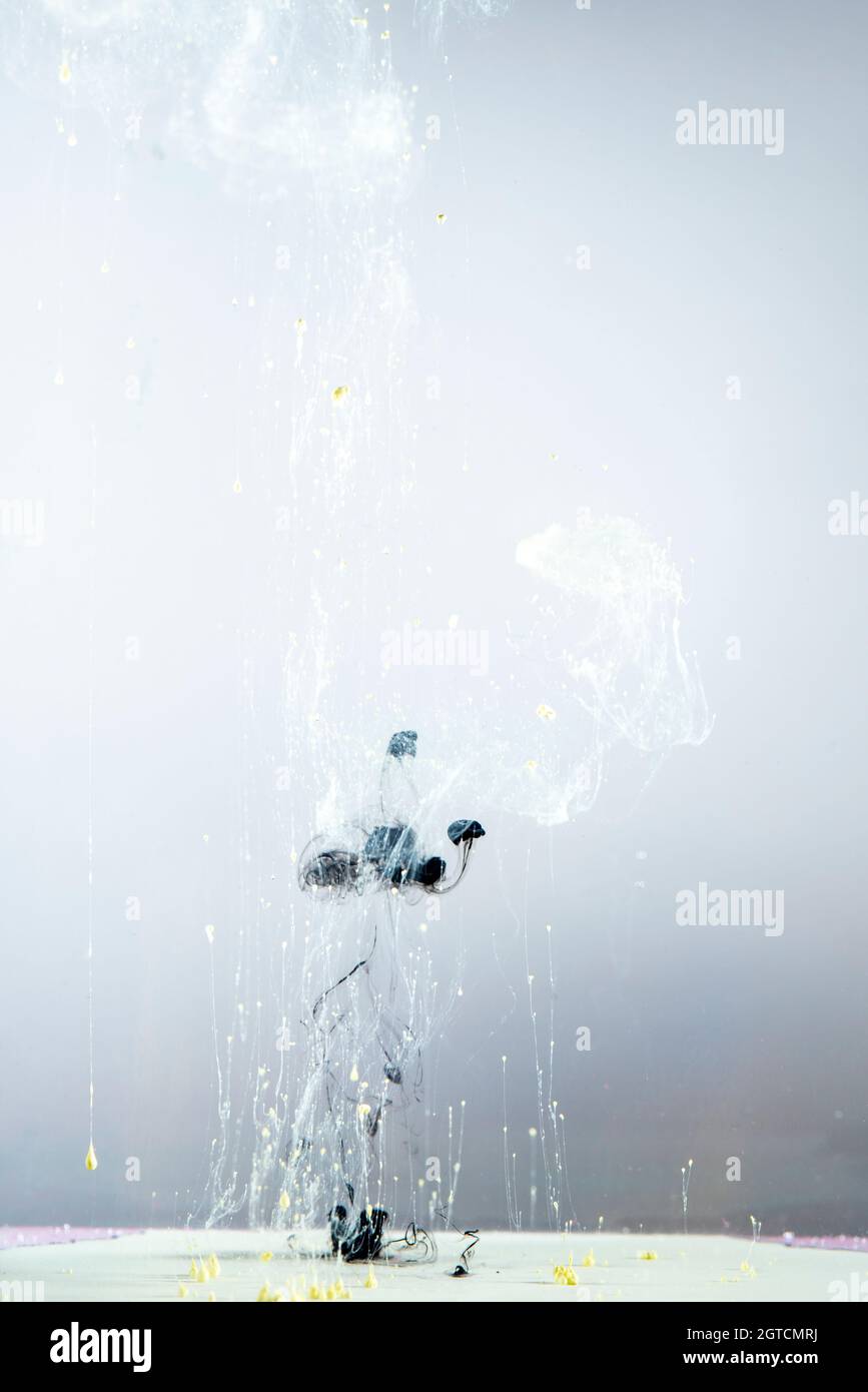 colours dropped in water Stock Photo - Alamy