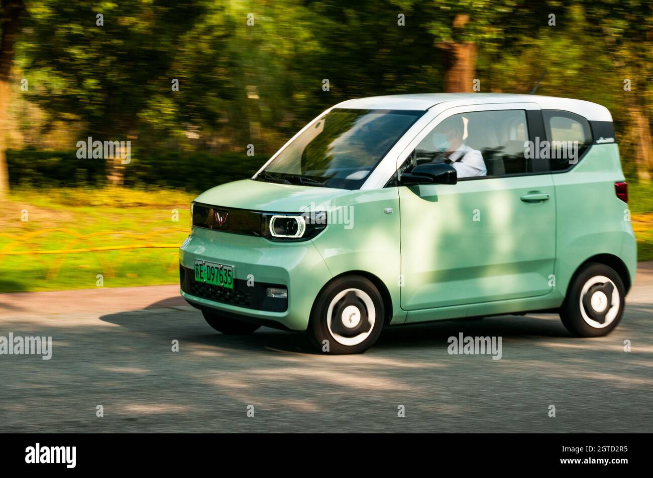 Moving shot of the Wuling Hongguang Mini EV Macaron taken in Suzhou ...