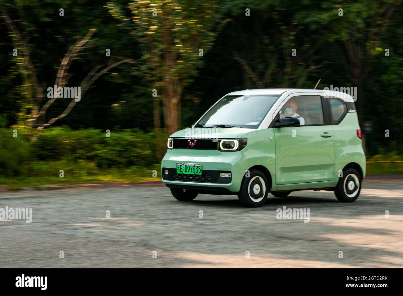 Moving shot of the Wuling Hongguang Mini EV Macaron taken in Suzhou ...