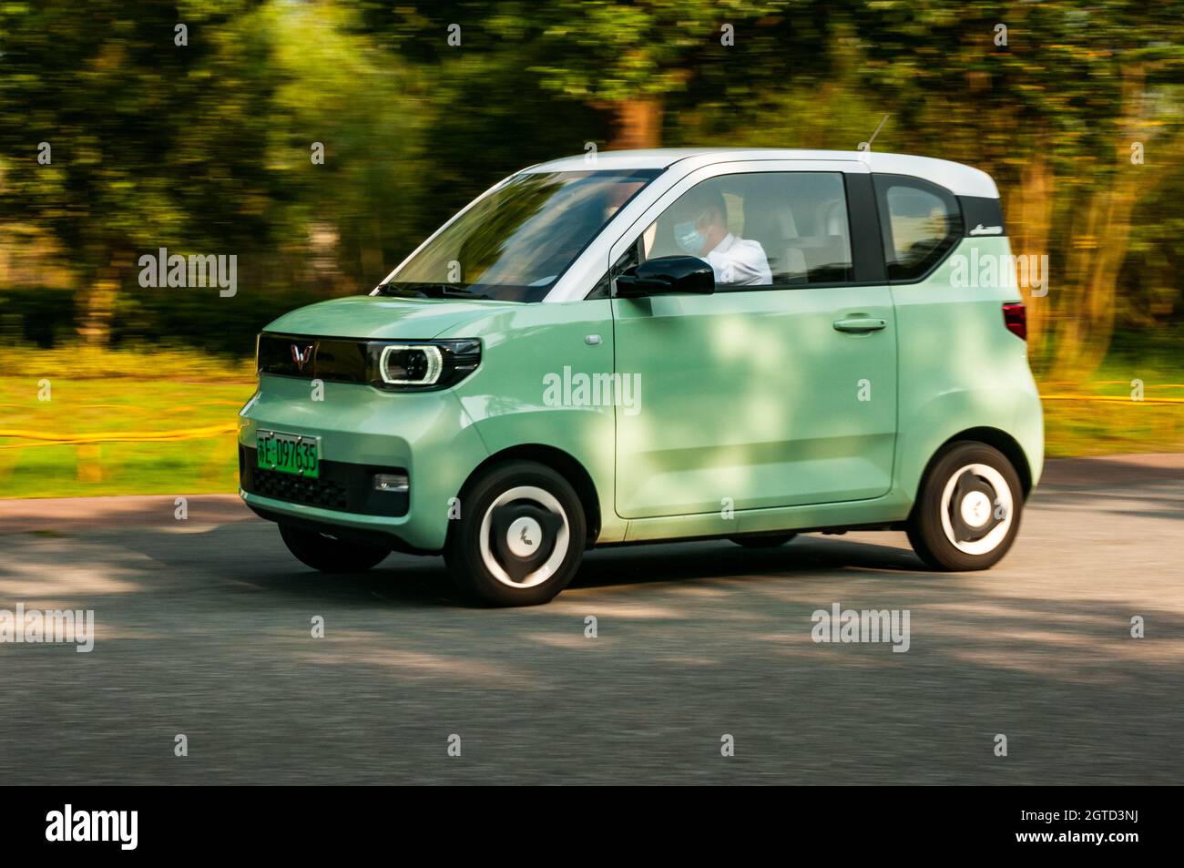 Moving shot of the Wuling Hongguang Mini EV Macaron taken in Suzhou ...