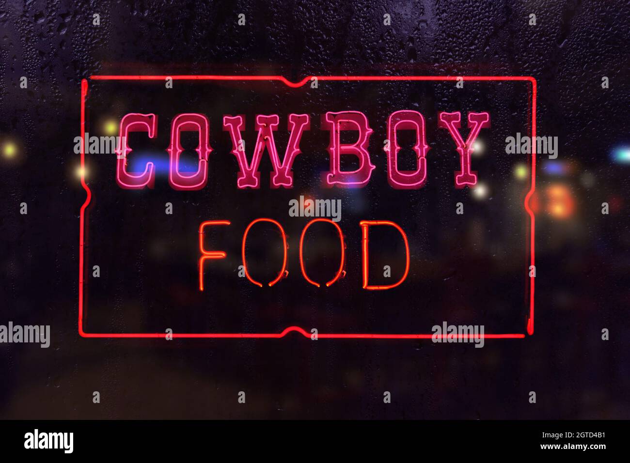 Vintage neon cowboy sign hi-res stock photography and images - Alamy