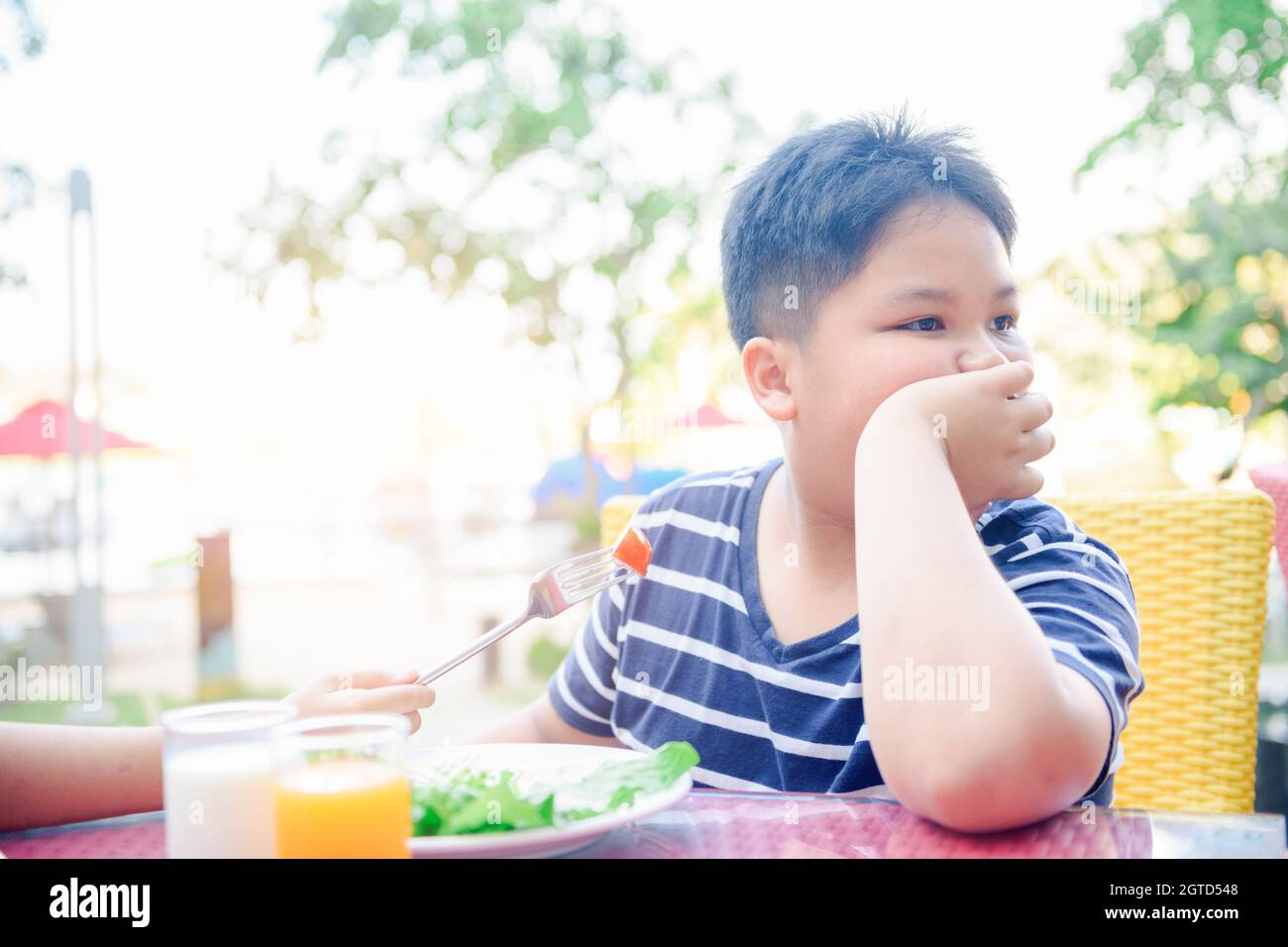 Overweight boy crying hi-res stock photography and images - Alamy