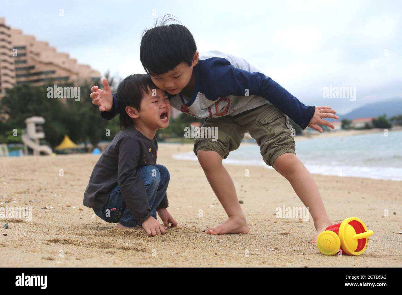 Baby beach crying hi-res stock photography and images - Alamy