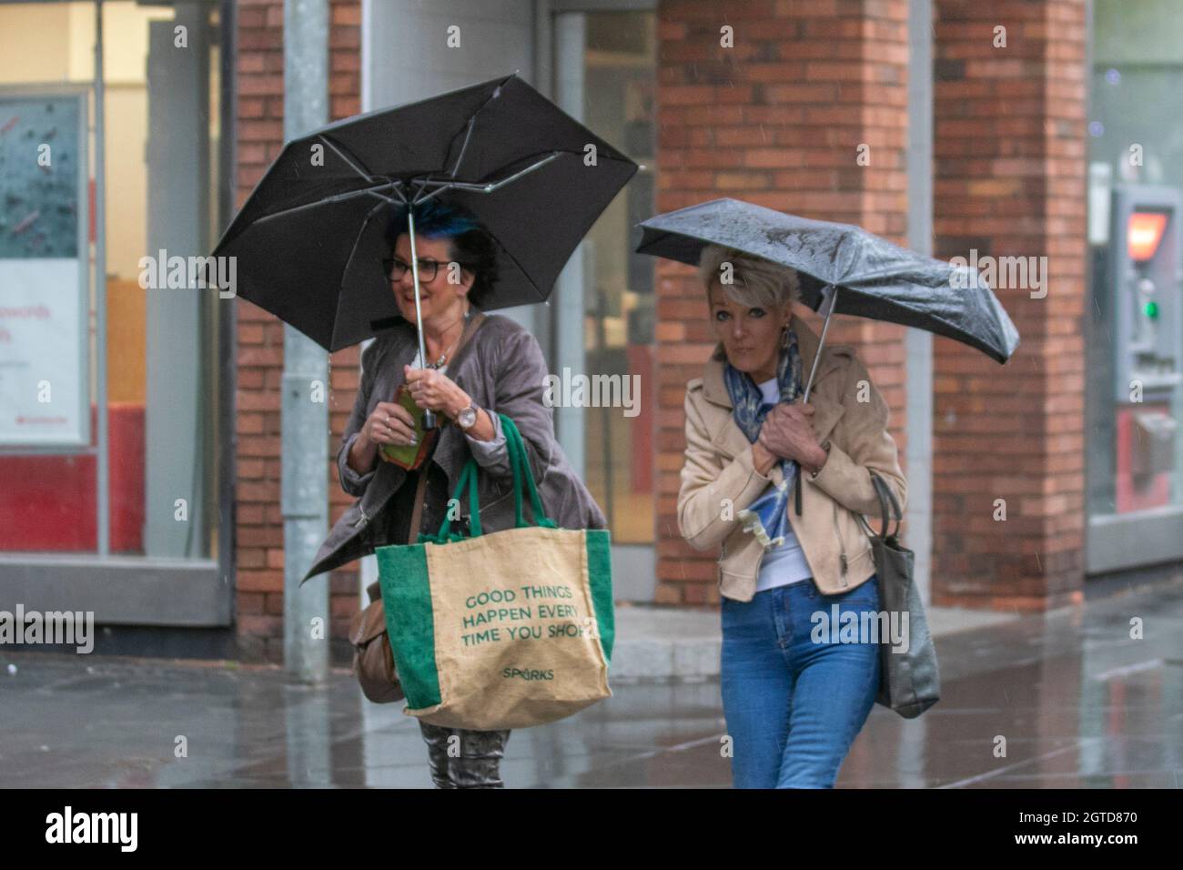 Strong winds and rain girl hi-res stock photography and images - Alamy