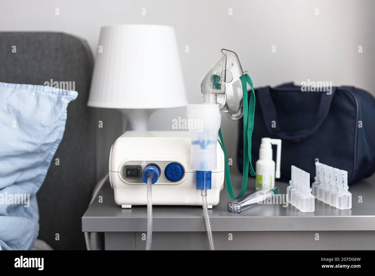 Nebuliser With Breathing Mask And Medicines On Bedside Table Stock ...