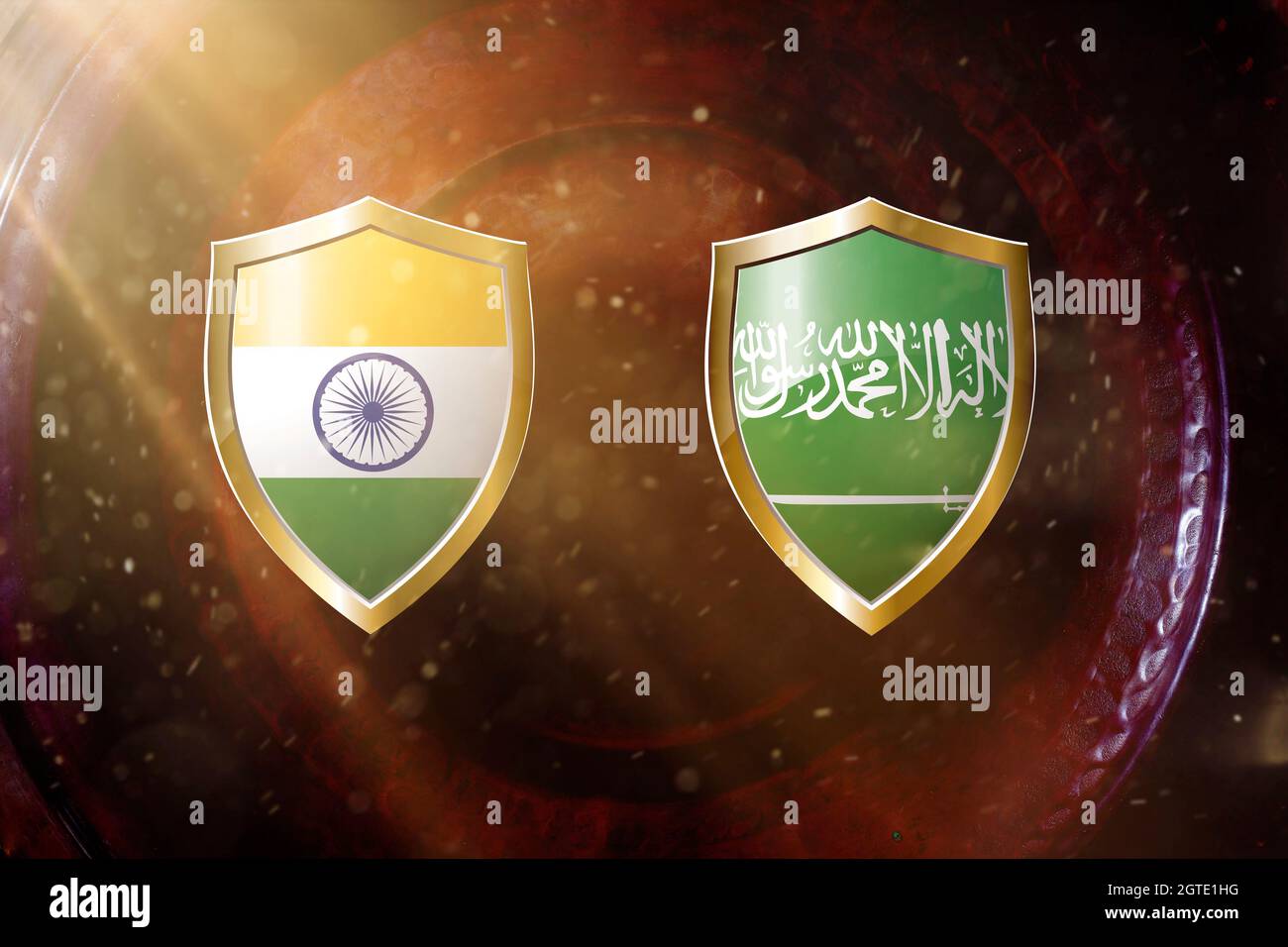 india and saudi arabia flag in golden shield on copper texture ...