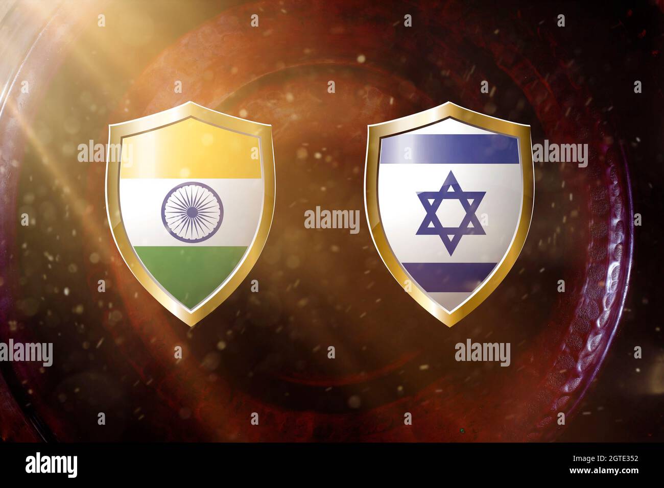 india and israel flag in golden shield on copper texture background.3d ...
