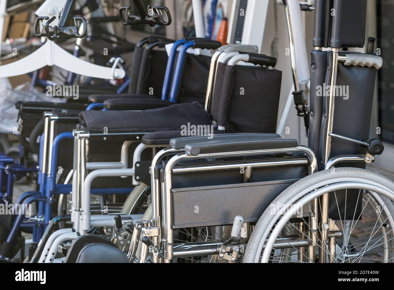 Row of wheelchairs hi-res stock photography and images - Alamy