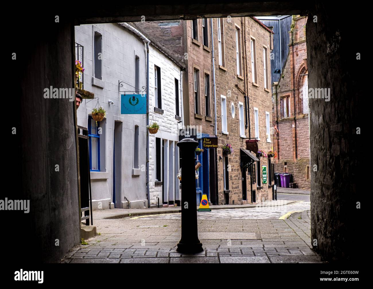 This is the narrow cobbled Osnaburg Street in the town centre of Forfar ...