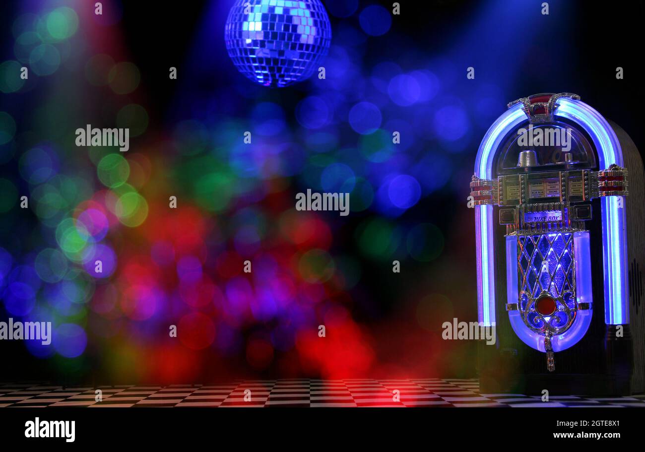Jukebox in Bar with Disco Ball and Bokeh Composite Image Stock Photo ...