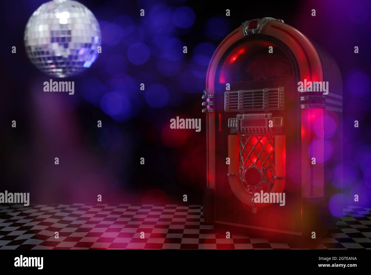 Jukebox in Bar with Disco Ball and Bokeh Composite Image Stock Photo ...