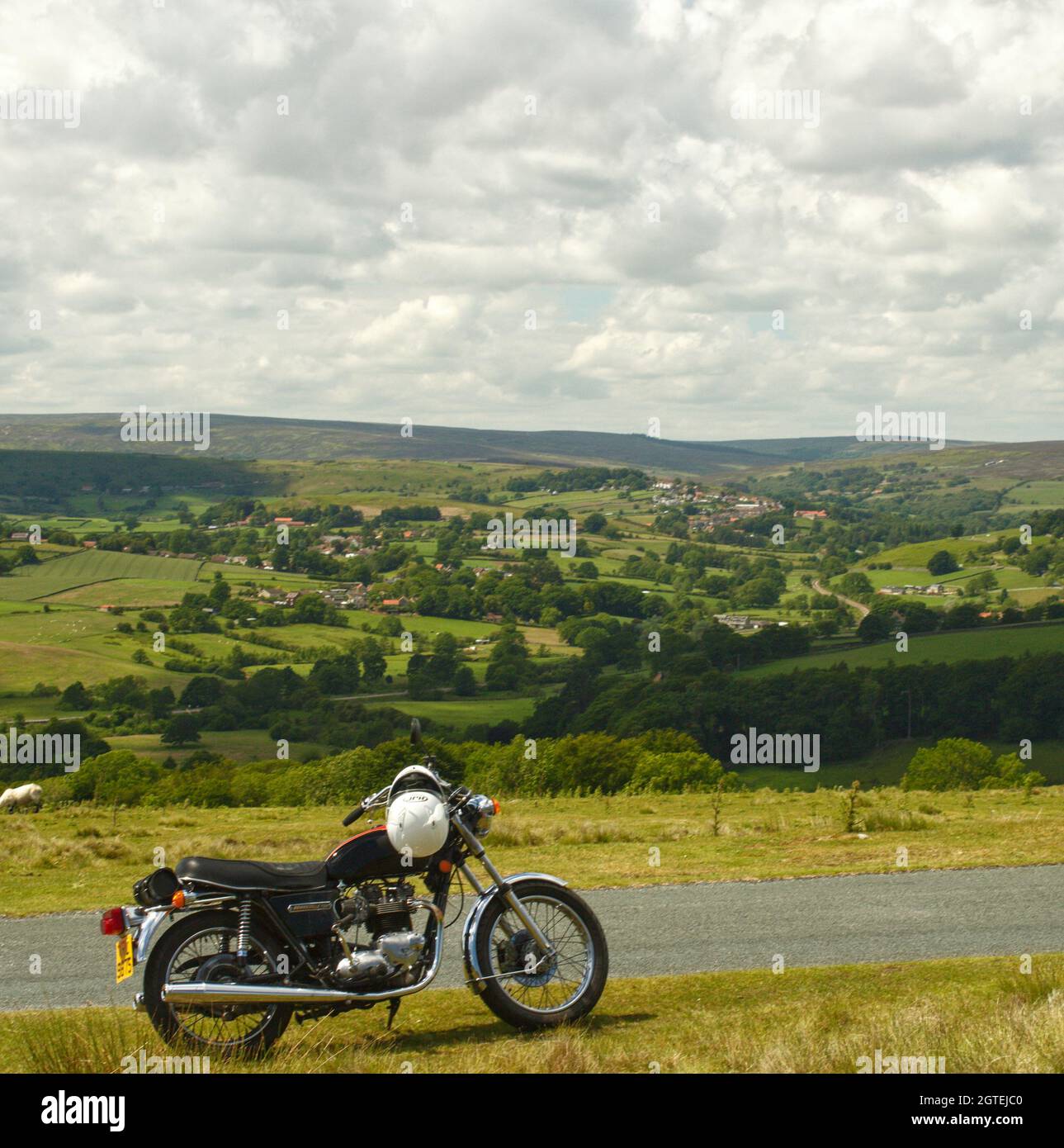 Motorcycle and car on winding road hi-res stock photography and images ...