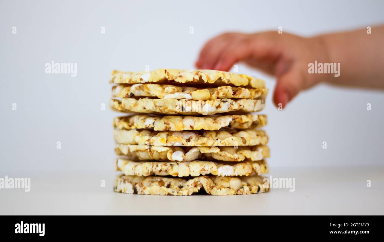Child eating rice hands hi-res stock photography and images - Alamy