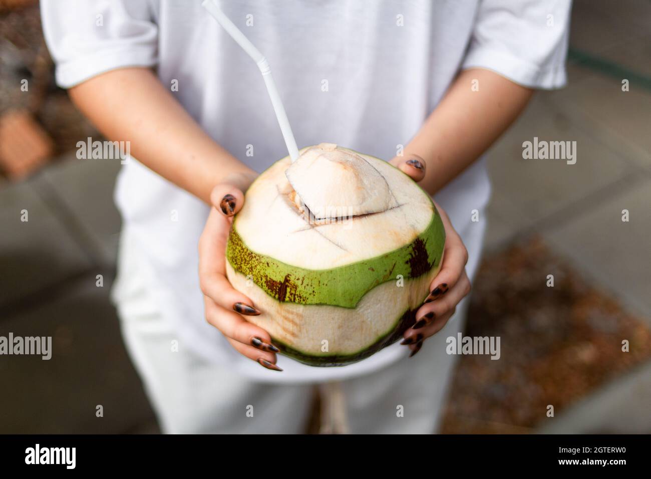 Child eating coconut hi-res stock photography and images - Alamy