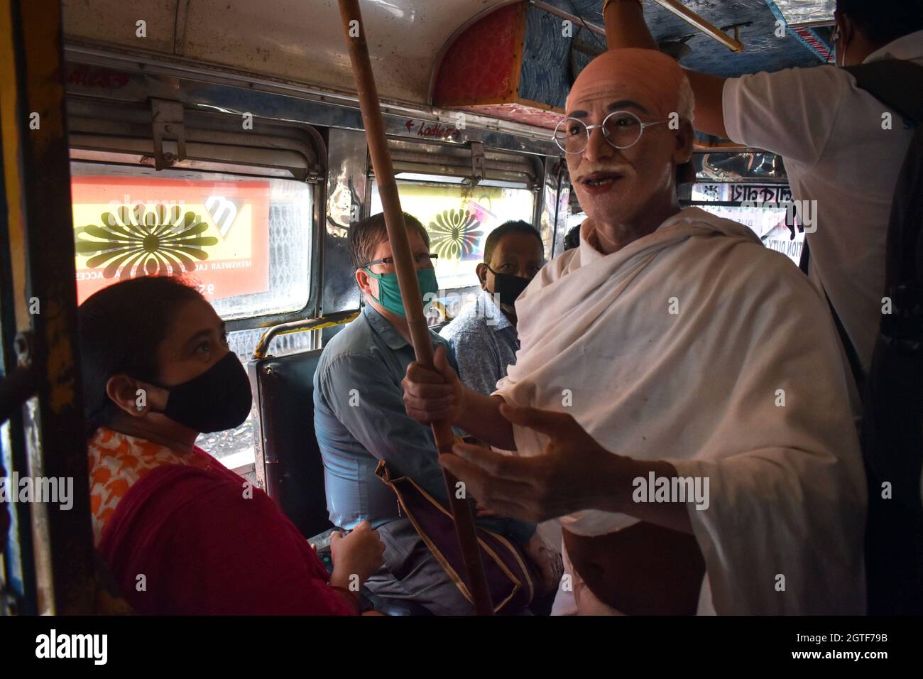 Kolkata, India. 02nd Oct, 2021. Krishna Bairagi a Bahurupi artist is dressed up like an iconic ...
