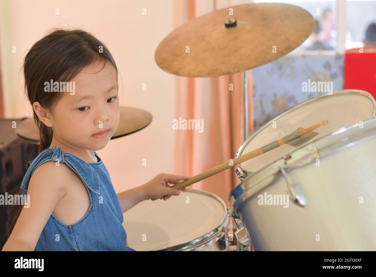 Asian Girl Playing Drum High Resolution Stock Photography and Images ...