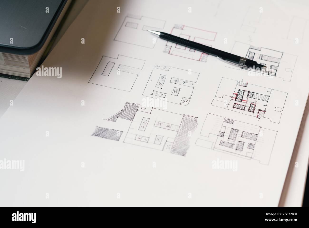 Architect Desk With Hand-drawn Plan Sketches And Pencil Stock Photo - Alamy