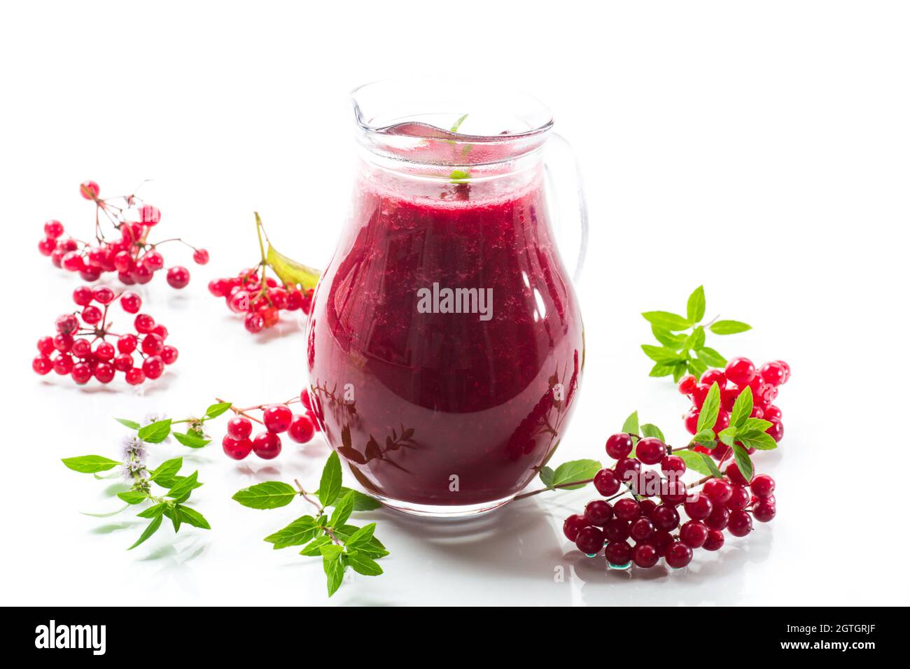 freshly squeezed thick natural juice with pulp from ripe red viburnum ...
