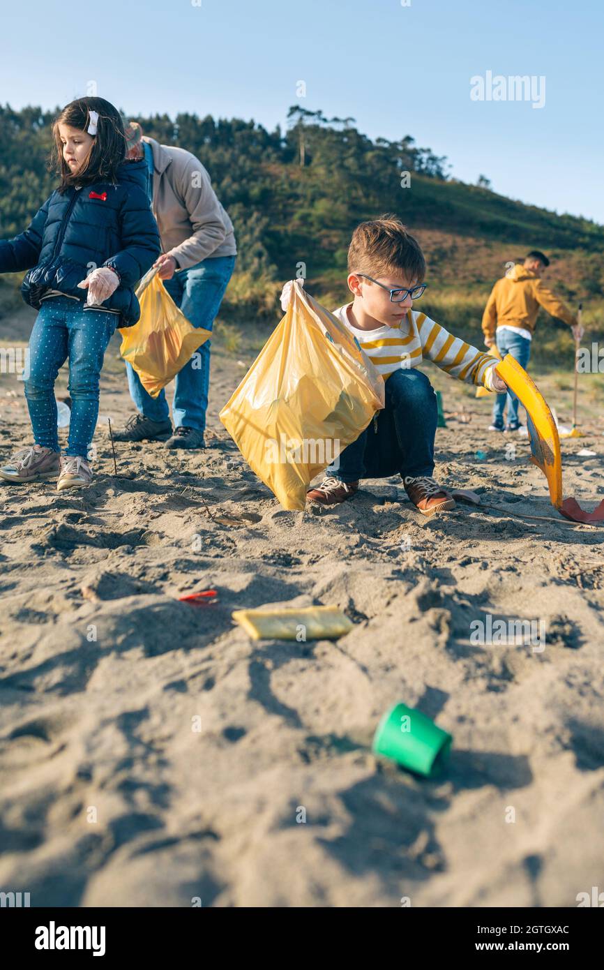 Picking Up Litter Boy High Resolution Stock Photography and Images - Alamy