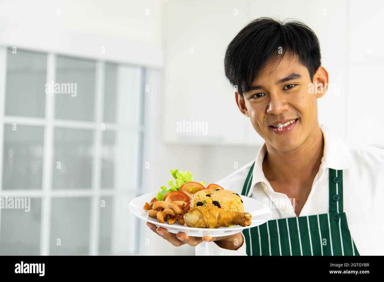 Man eating fried rice hi-res stock photography and images - Alamy