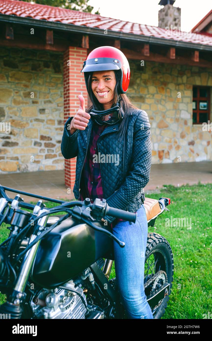 Woman Sitting On Back Motorbike High Resolution Stock Photography and ...