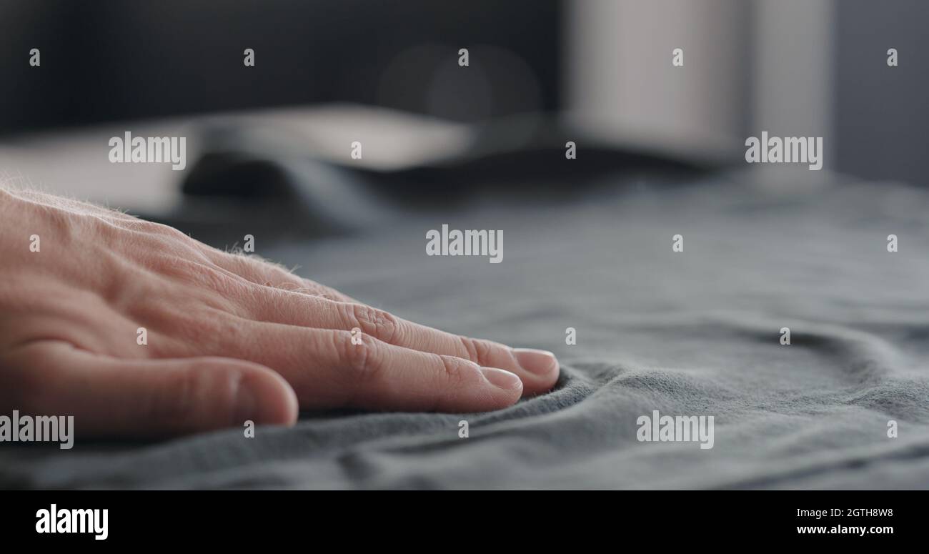 Finger touching cloth hi-res stock photography and images - Alamy