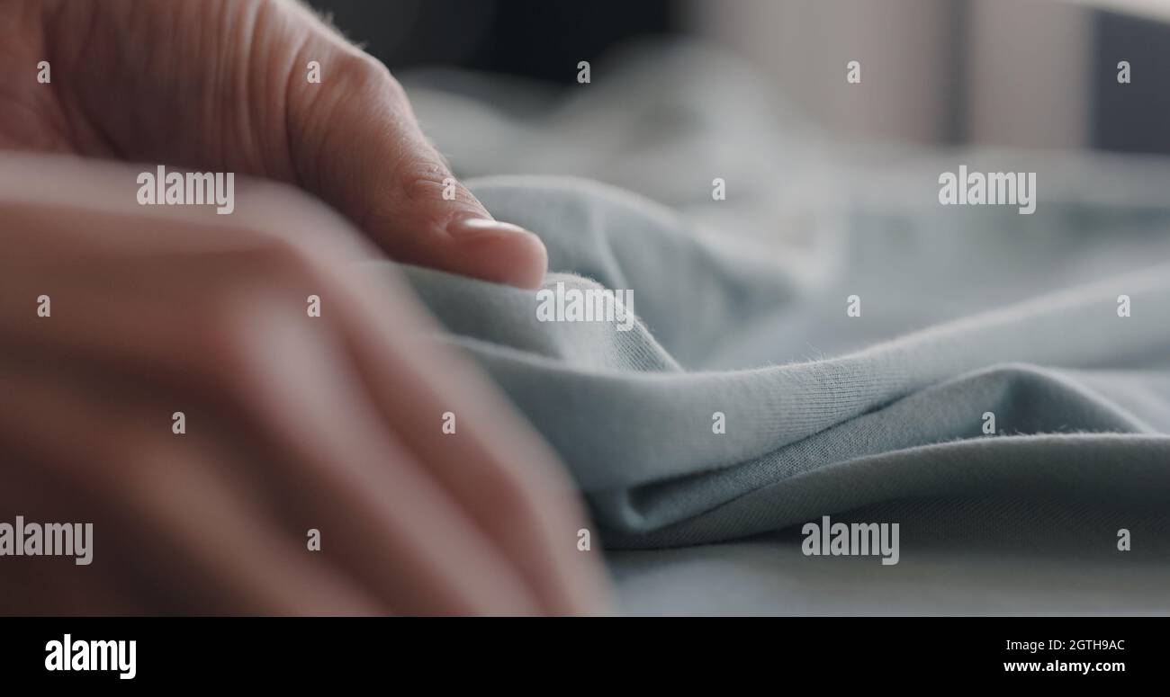 Finger touching cloth hi-res stock photography and images - Alamy