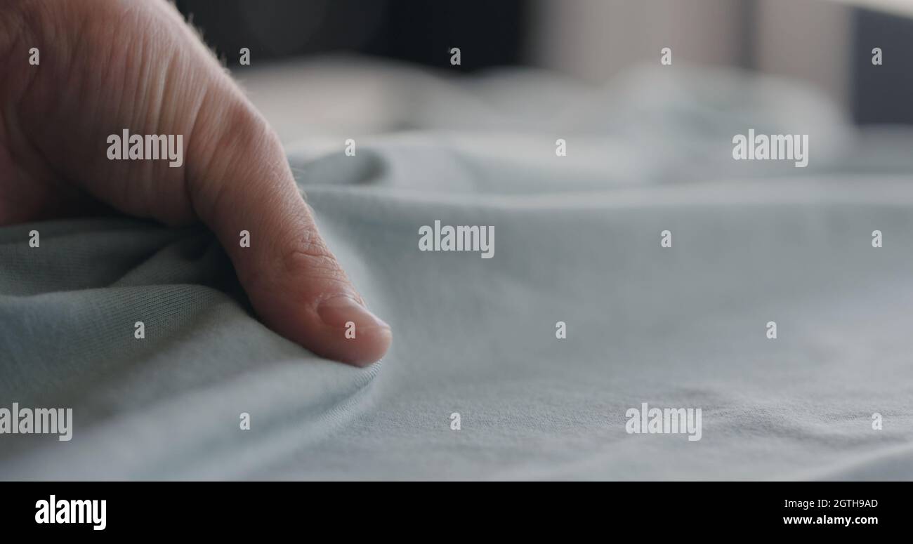 Finger touching cloth hi-res stock photography and images - Alamy