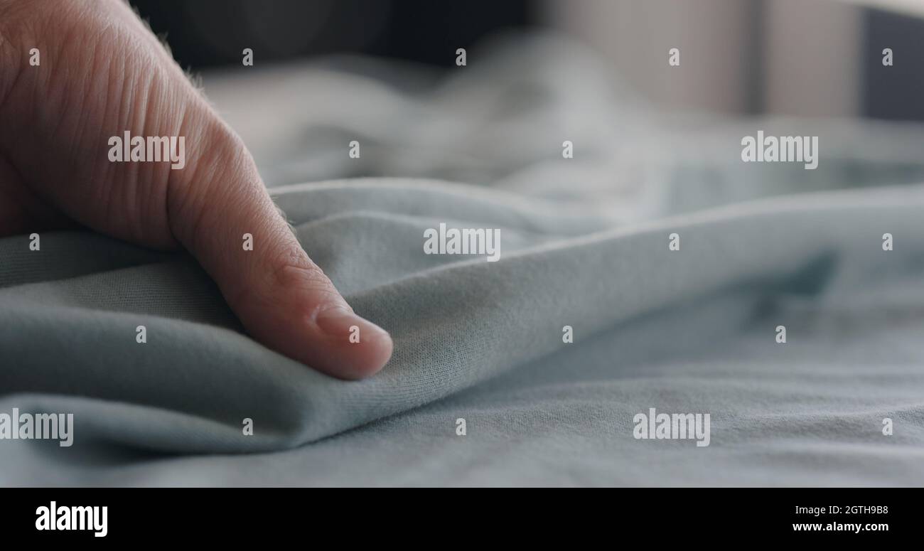 Finger touching cloth hi-res stock photography and images - Alamy