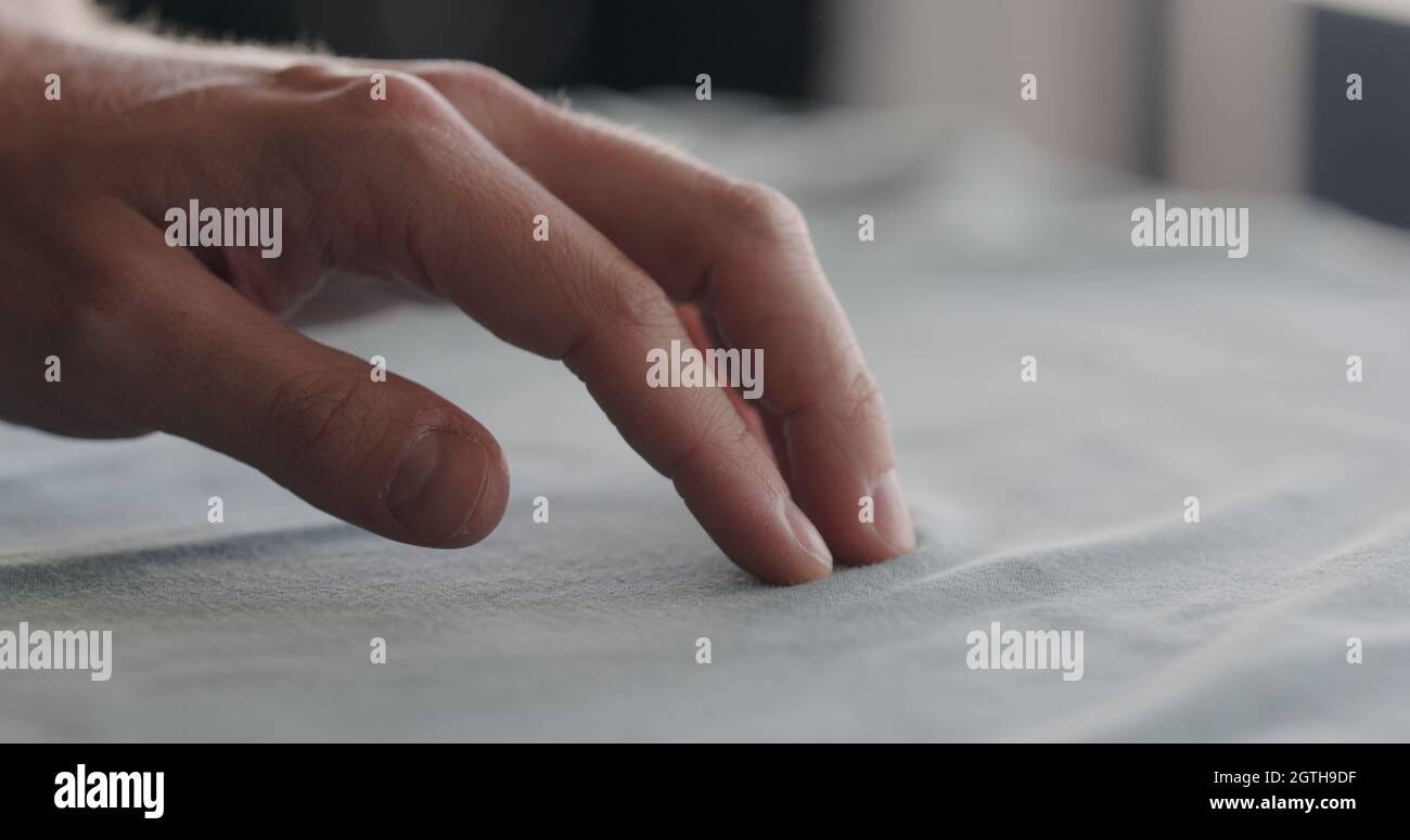Finger touching cloth hi-res stock photography and images - Alamy