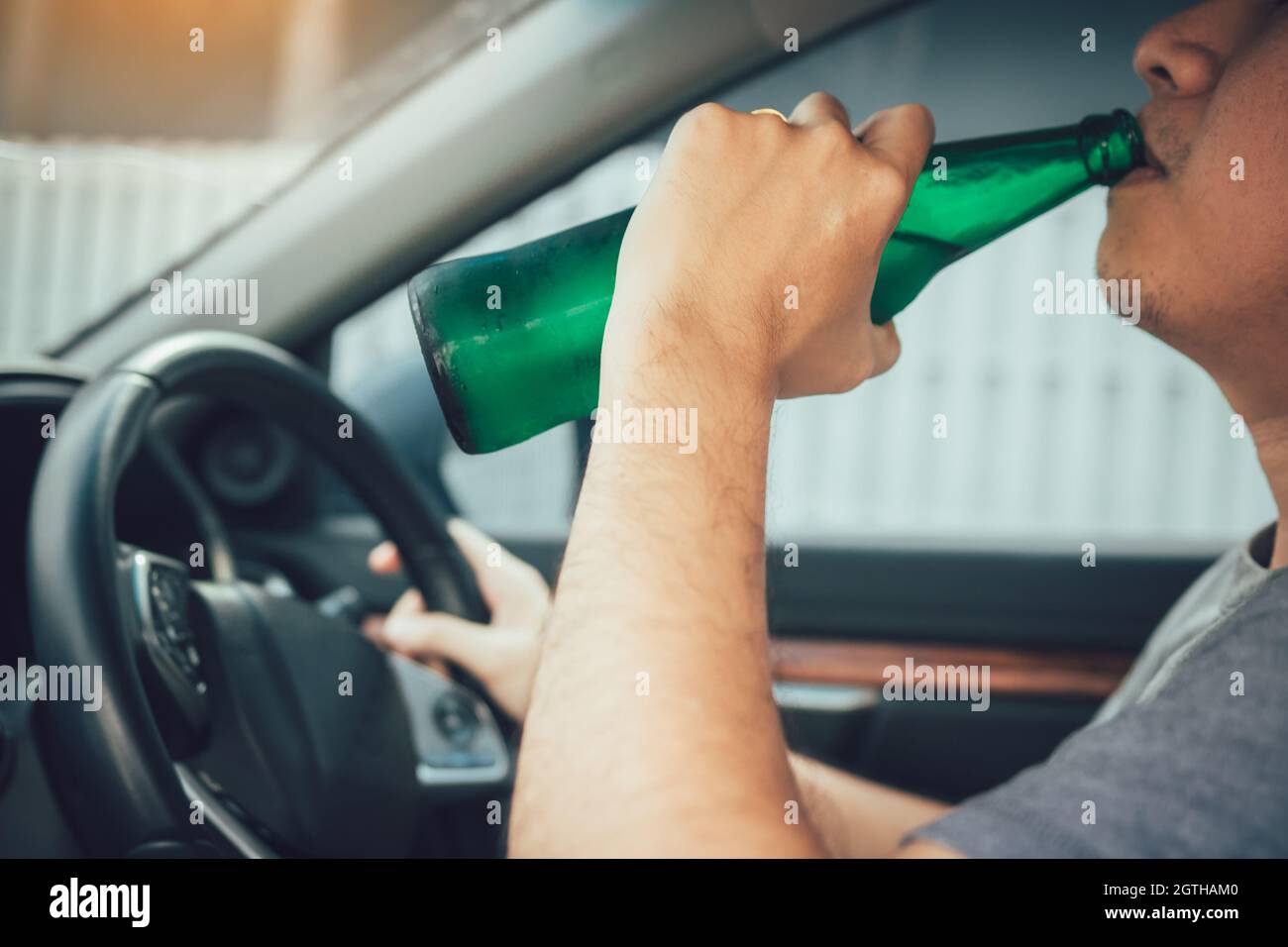 Man drinking beer in car hi-res stock photography and images - Alamy