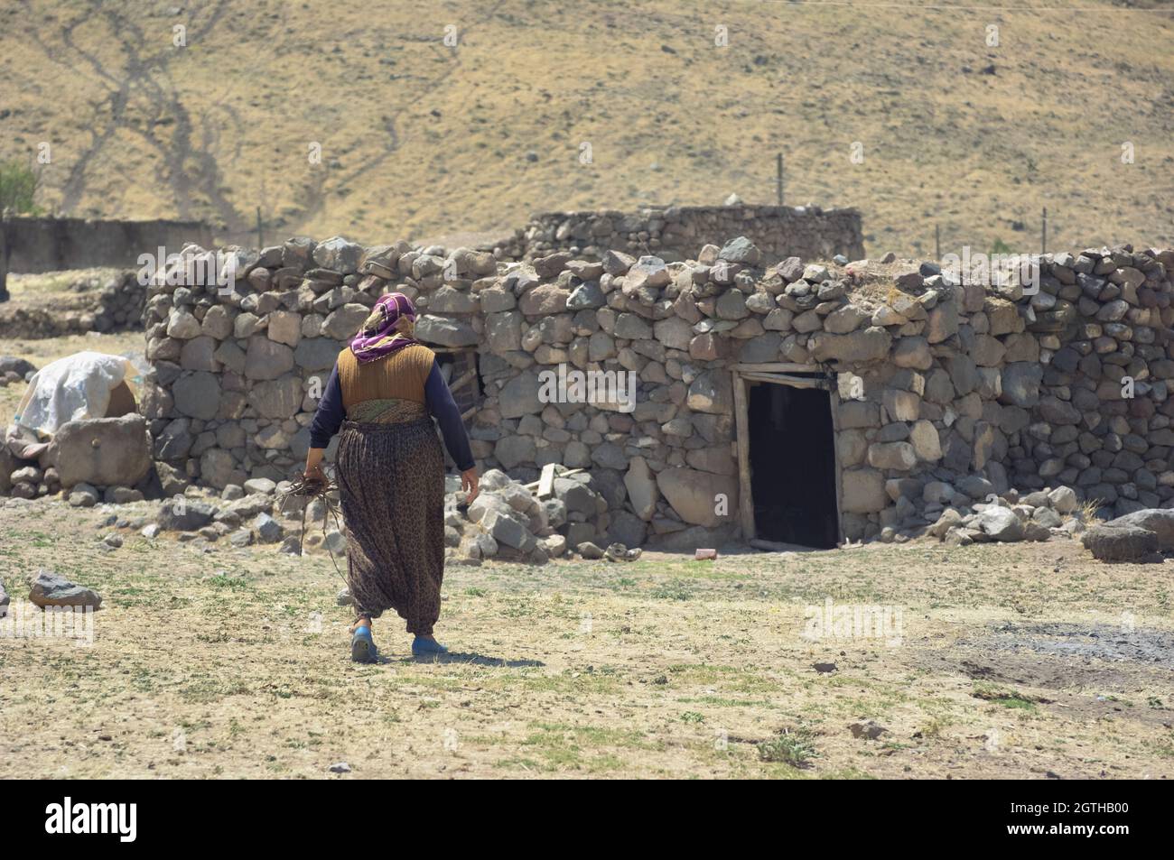 rural region of Turkey country an old woman in traditional clothes in a ...