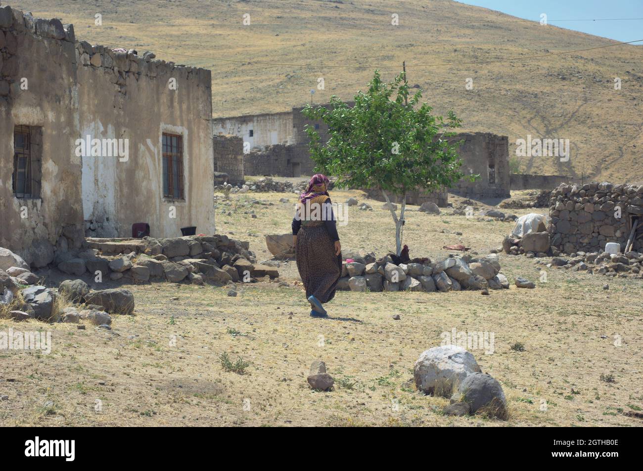 rural region of Turkey country an old woman in traditional clothes in a ...