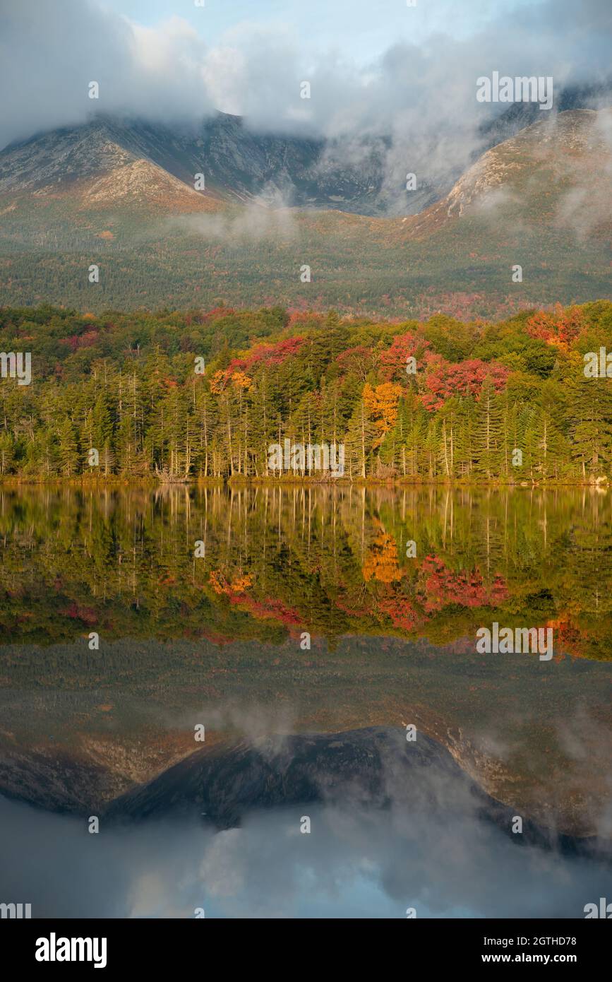Mount Katahdin reflected in Sandy Stream Pond at sunrise, early autumn ...