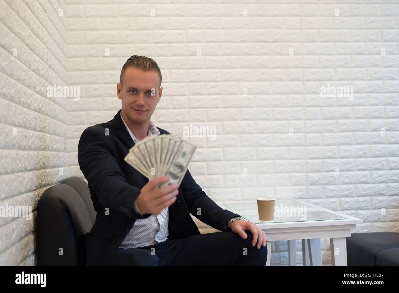 Brick wall showing men hi-res stock photography and images - Alamy