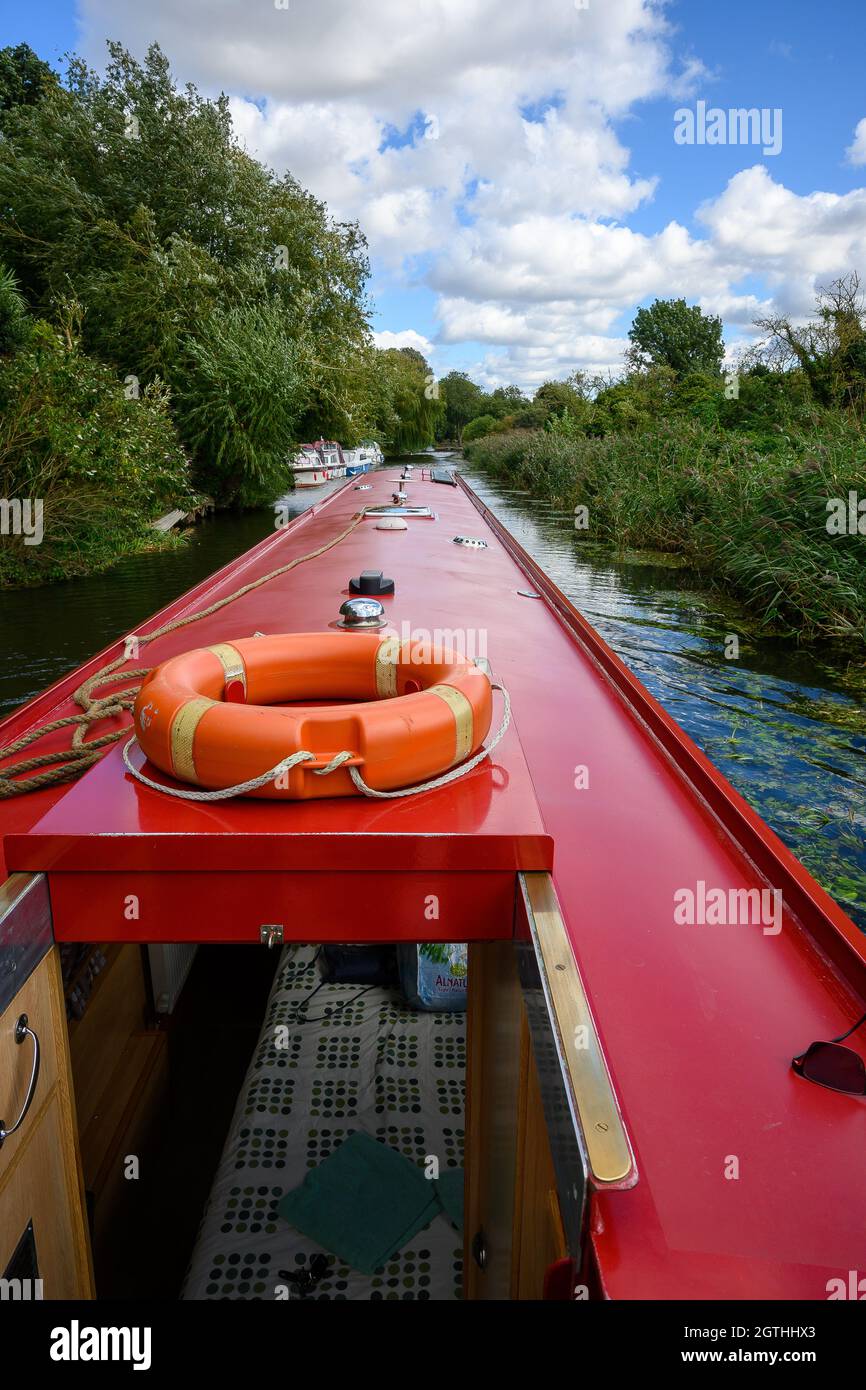 Cruising a narrow boat on the River Nene near March Stock Photo - Alamy