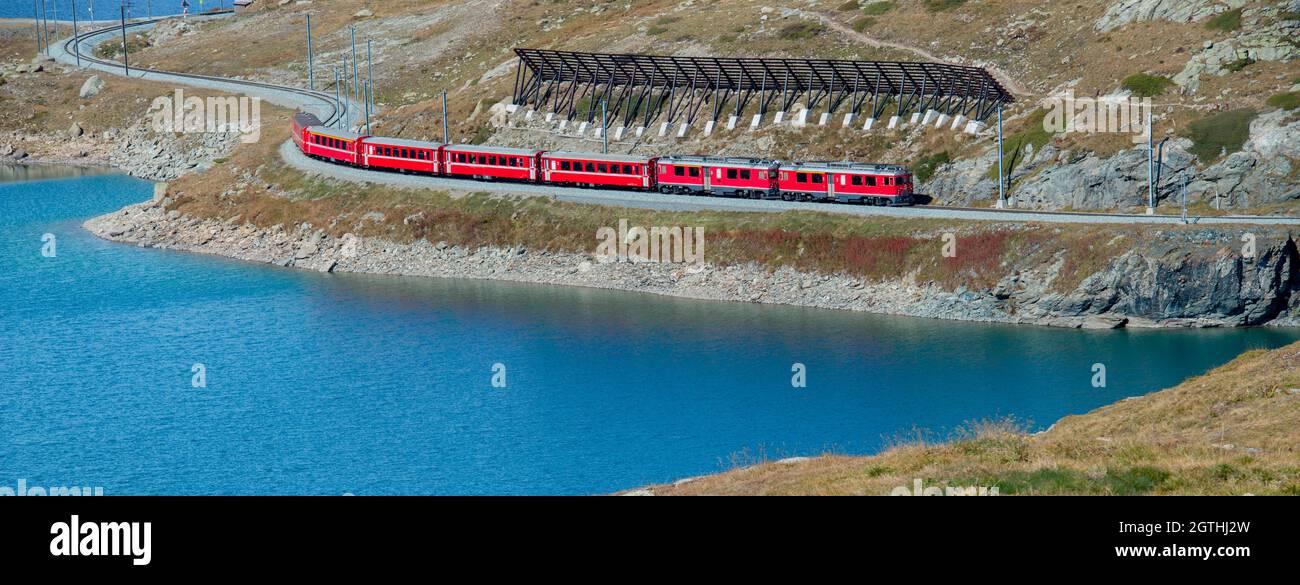 Bernina red train unesco heritage Stock Photo - Alamy
