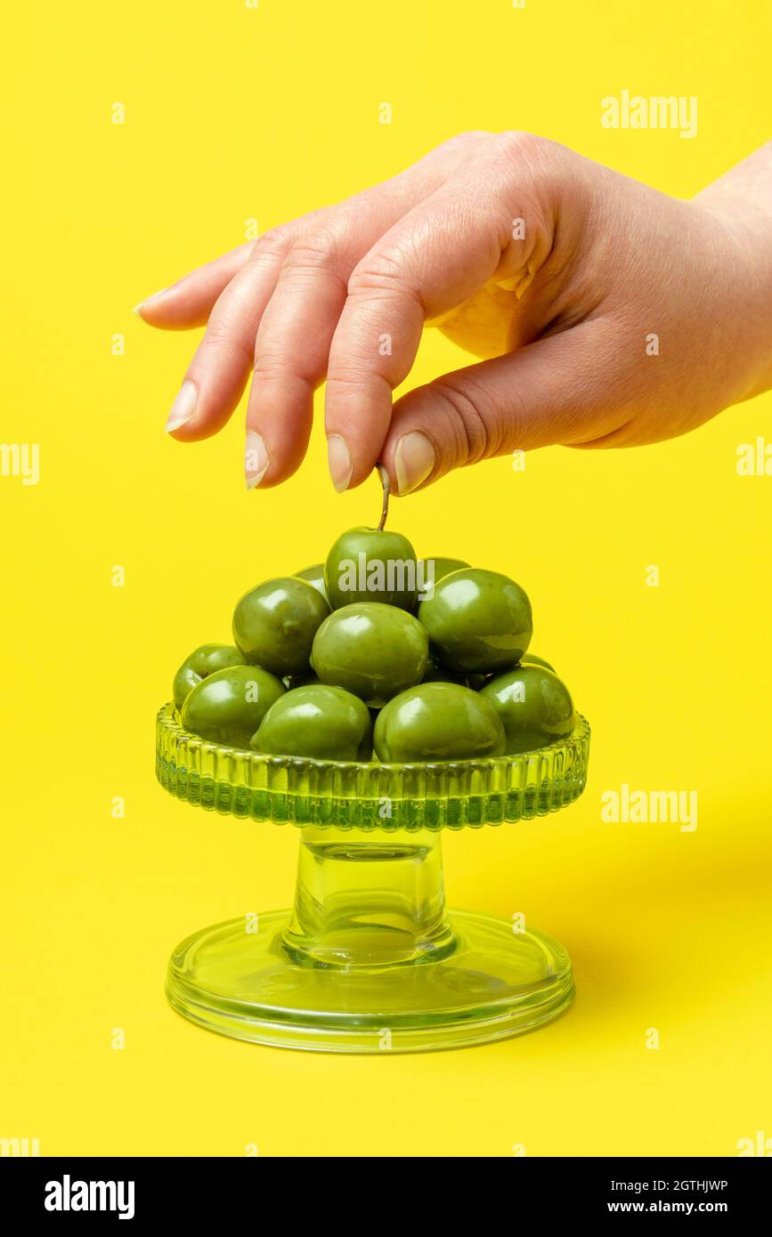 Hand grabbing a glass hi-res stock photography and images - Alamy