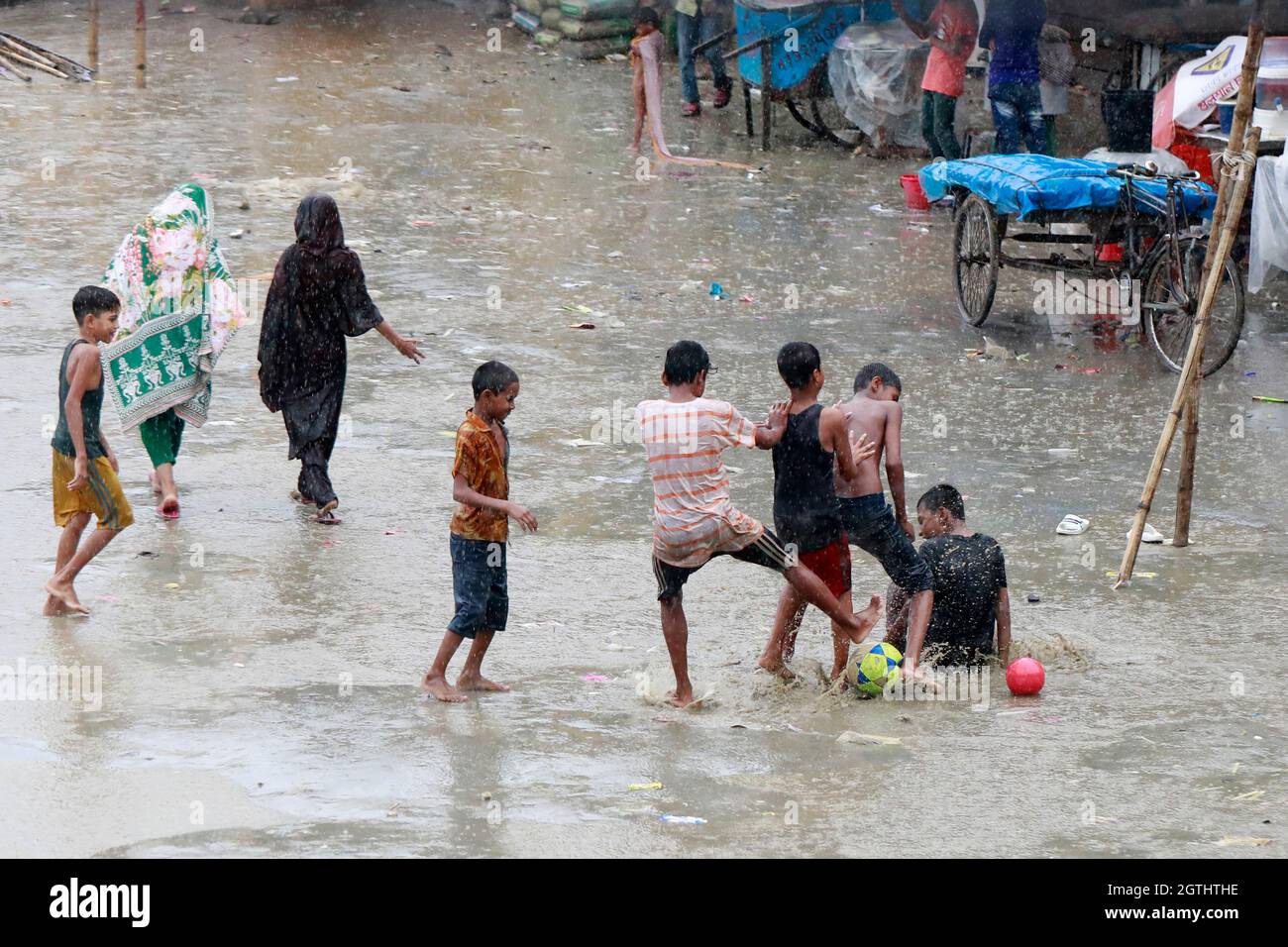 Dhaka, Bangladesh - September 29, 2021: Children play football in the ...