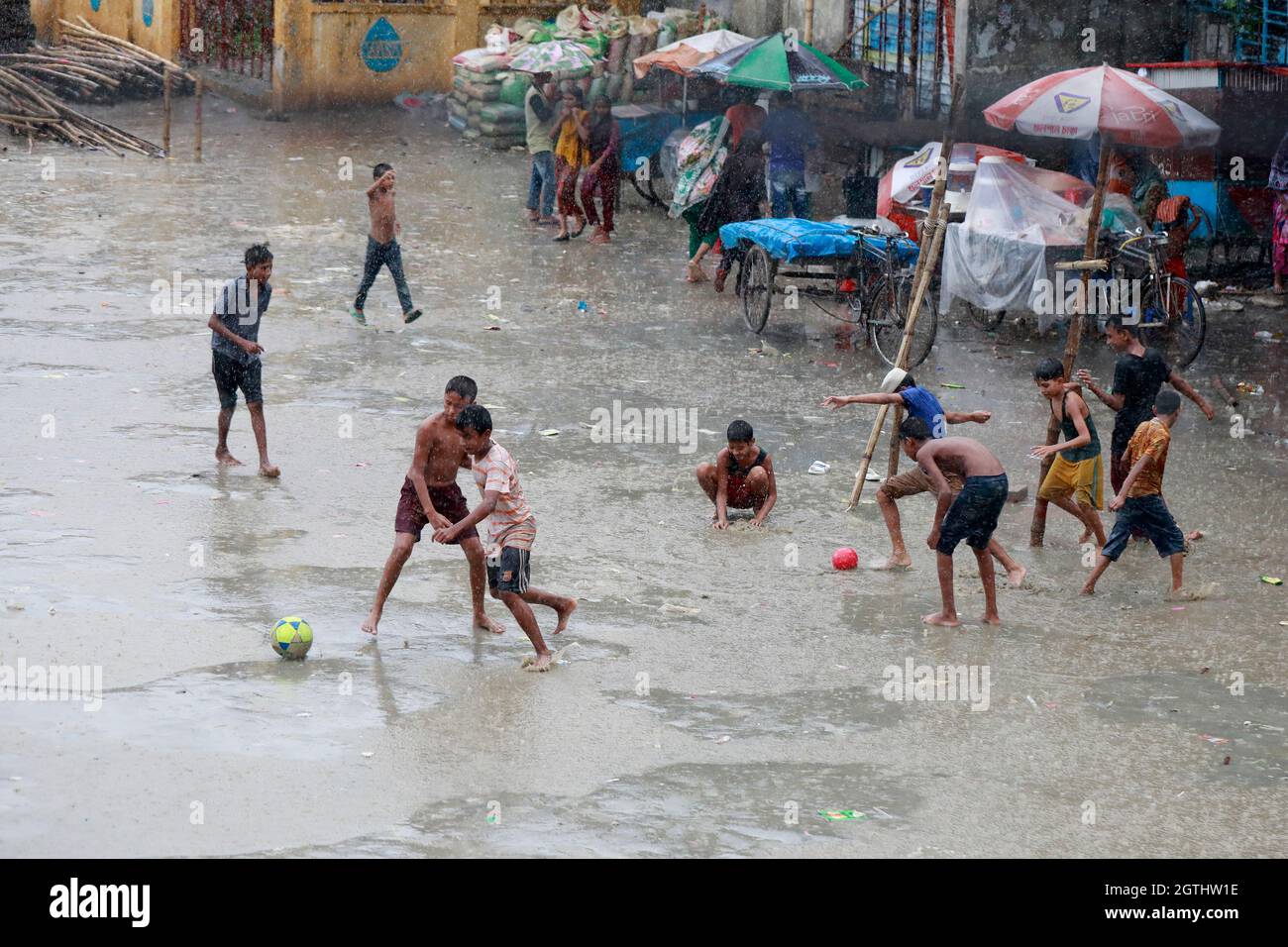 Dhaka, Bangladesh - September 29, 2021: Children play football in the ...