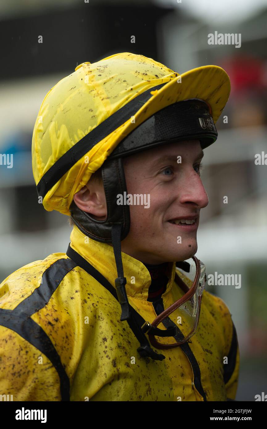 Ascot, UK. 2nd October, 2021. A muddy looking jockey Tom Marquand after ...