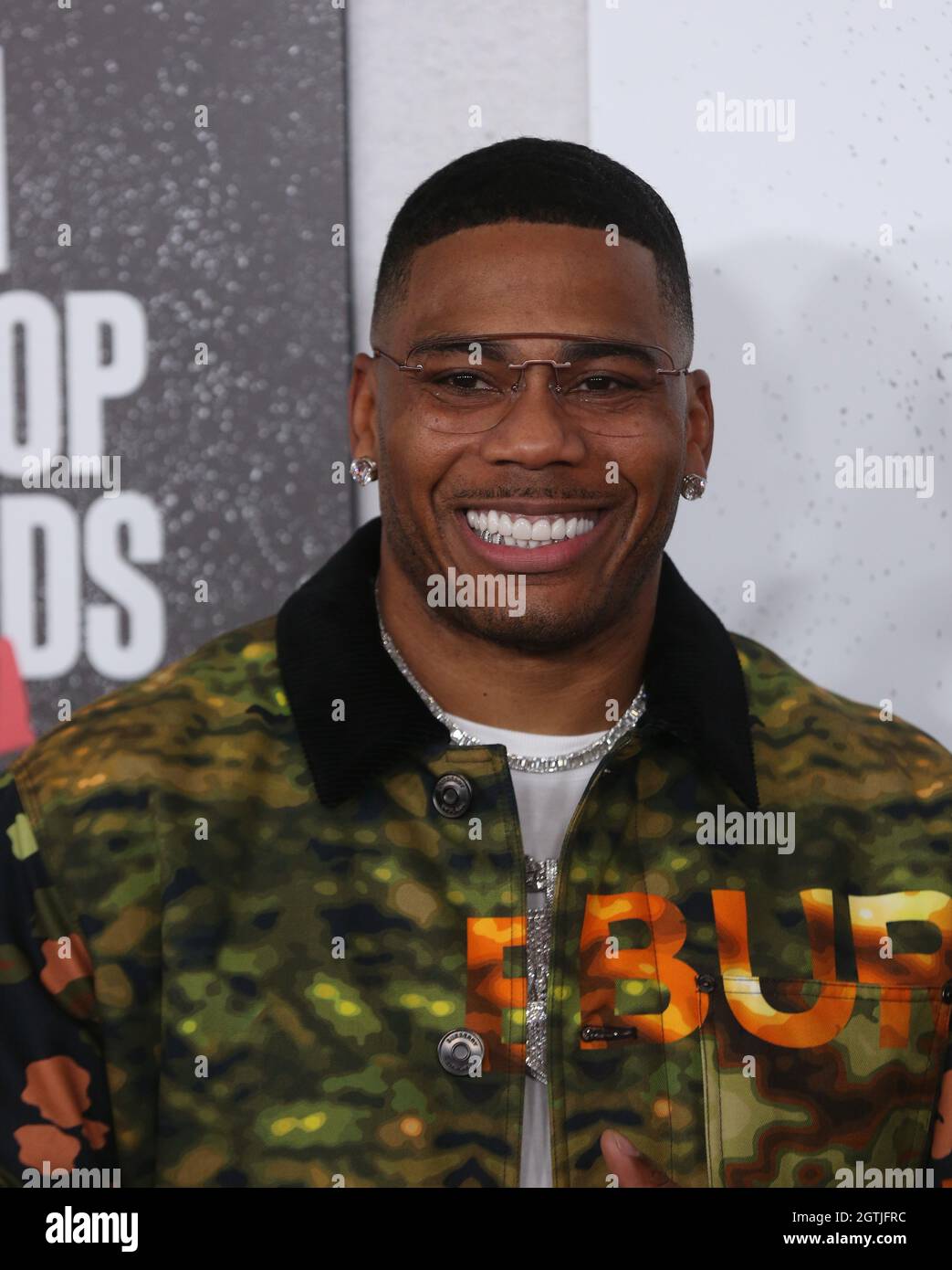 Nelly attends the 2021 BET Hip Hop Awards arrivals at the Cobb Energy ...