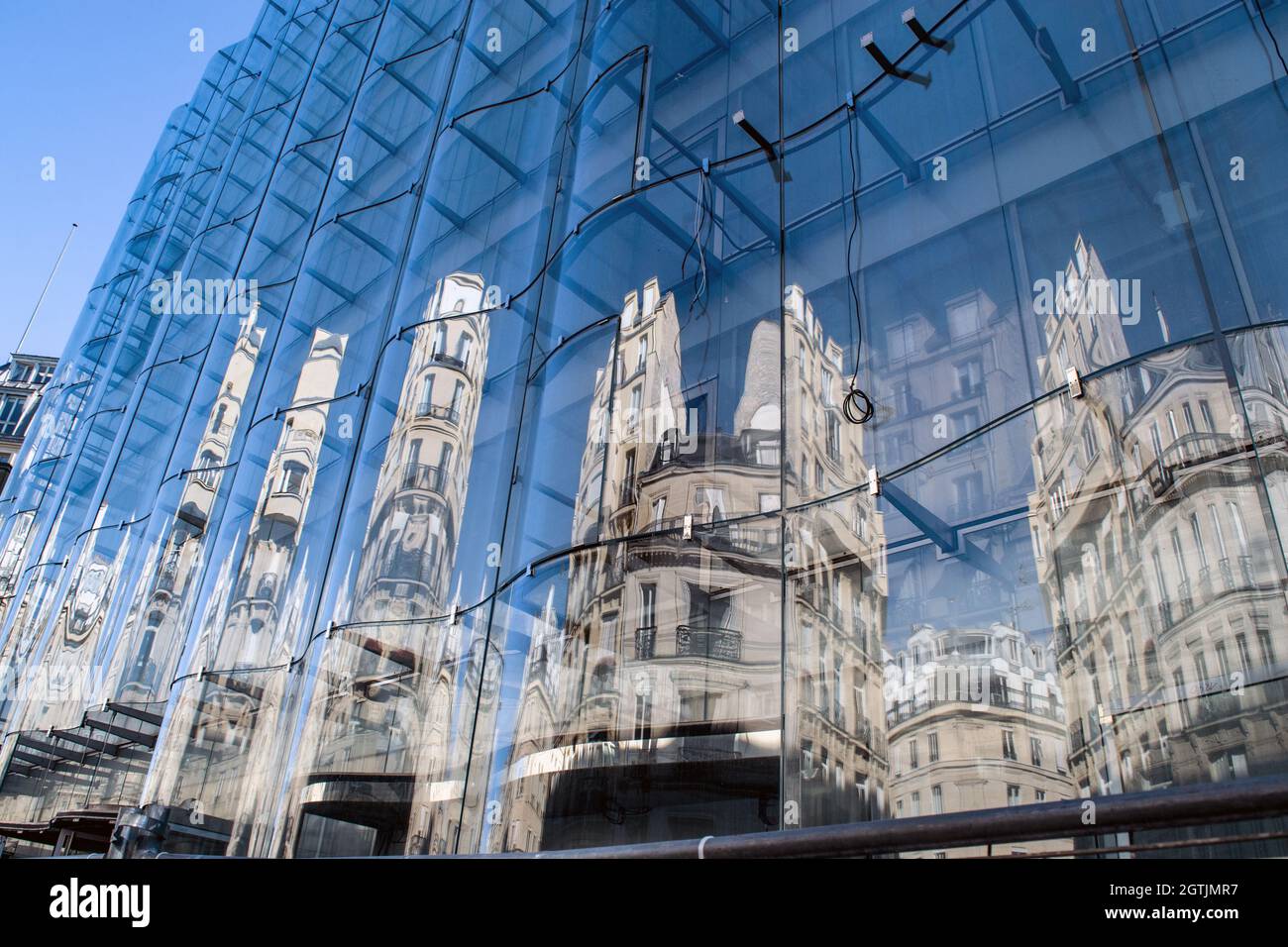 Buildings reflection on glass windows Stock Photo - Alamy
