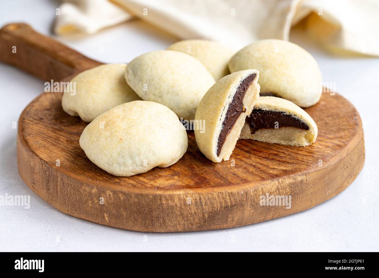 Cookies with chocolate filling on a white background. Freshly baked ...