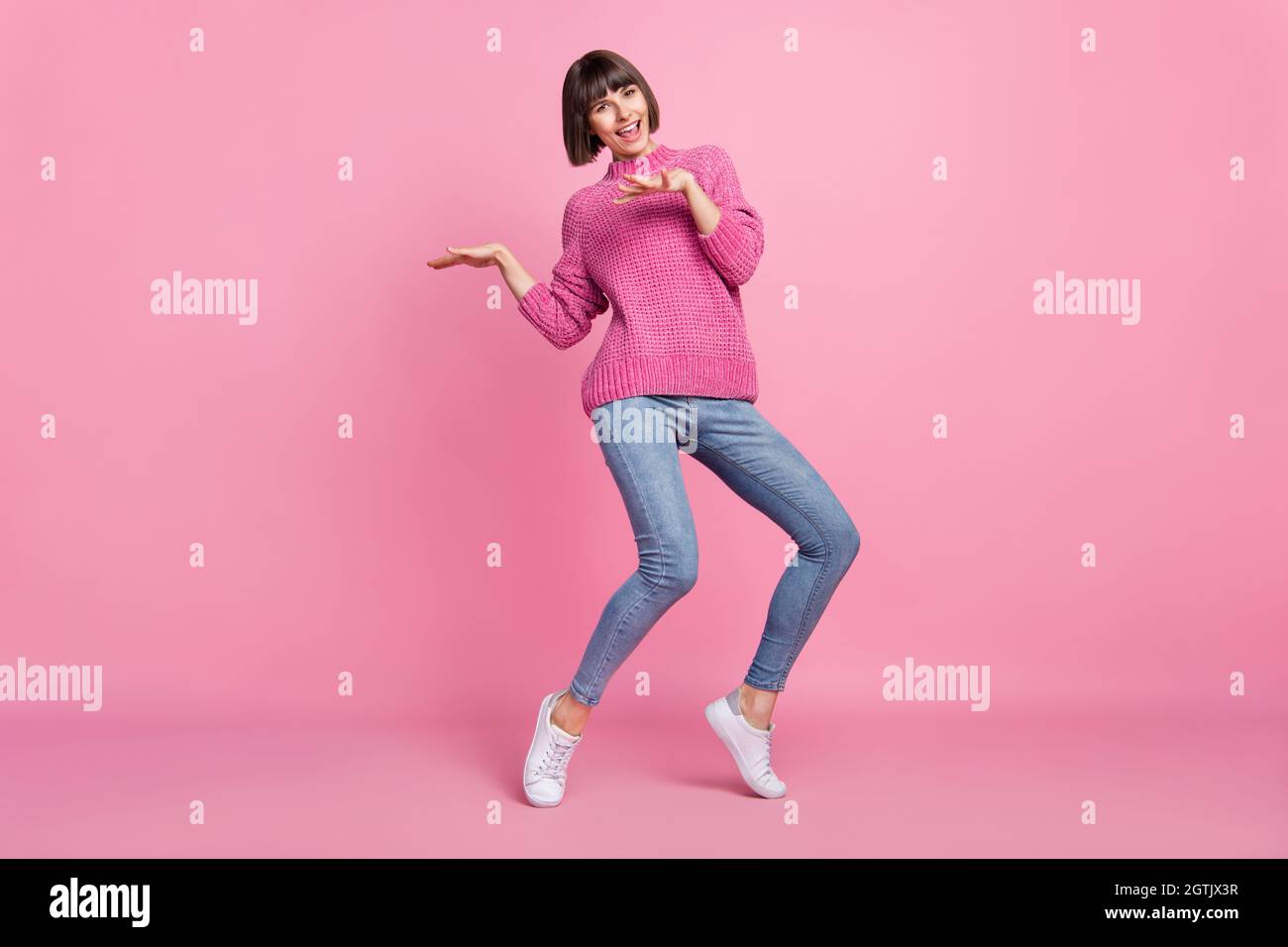 Full length photo of happy charming positive woman dance good mood ...