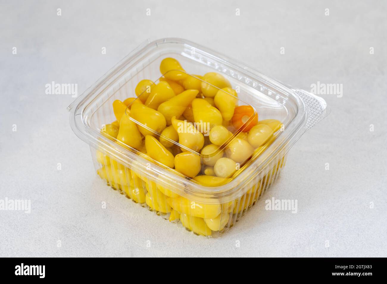 Packaged yellow hot pepper pickle Stock Photo - Alamy