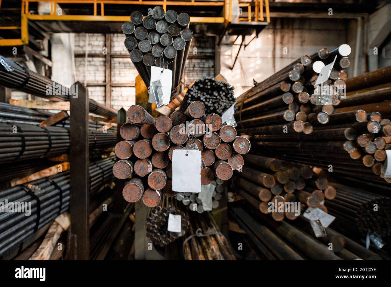 Hot rolled steel, bundle of round metal rods close-up Stock Photo - Alamy